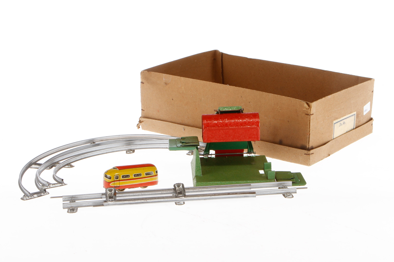 Blechbahn mit 1 Fahrzeug, Uhrwerk - auctions & price archive